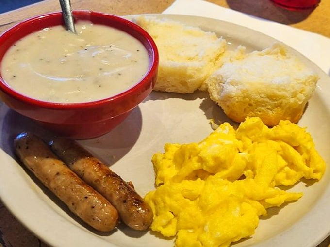 Scrambled eggs, sausage links, and biscuits swimming in gravy: this is what breakfast dreams are made of, folks.