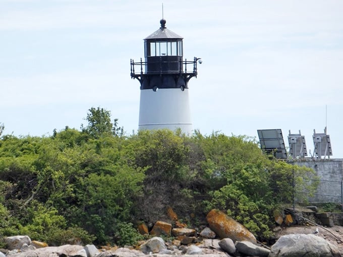 Ten Pound Island Lighthouse has been guiding ships home since before GPS made us all navigationally incompetent and proud.