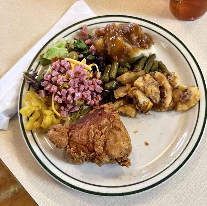 A plate this loaded with Southern classics represents the beautiful chaos of buffet decision-making at its finest.
