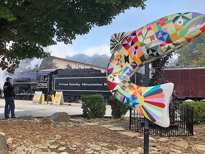 Even the local art celebrates the railroad's charm, because when trains are this beloved, they inspire public creativity.