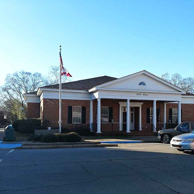 City Hall maintains its dignified presence, watching over Greensboro with classic Southern grace and brick columns.