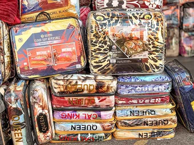 Blankets stacked high in wild patterns, from leopard print to designs that make bold decorating statements everywhere.