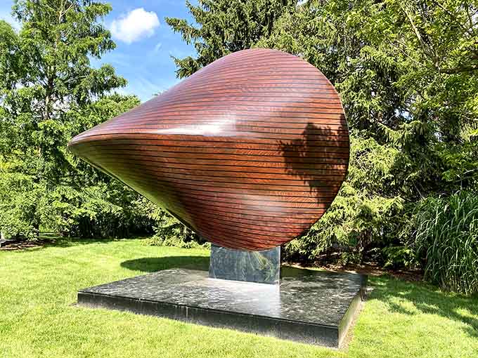 A wooden seashell that looks like it washed up from a very artistic ocean, perfectly balanced and impossibly beautiful.