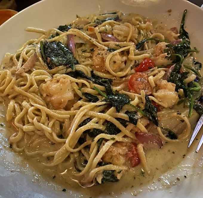 Shrimp scampi pasta swimming in garlic, butter, and wine sauce makes carb-counting suddenly seem less important.