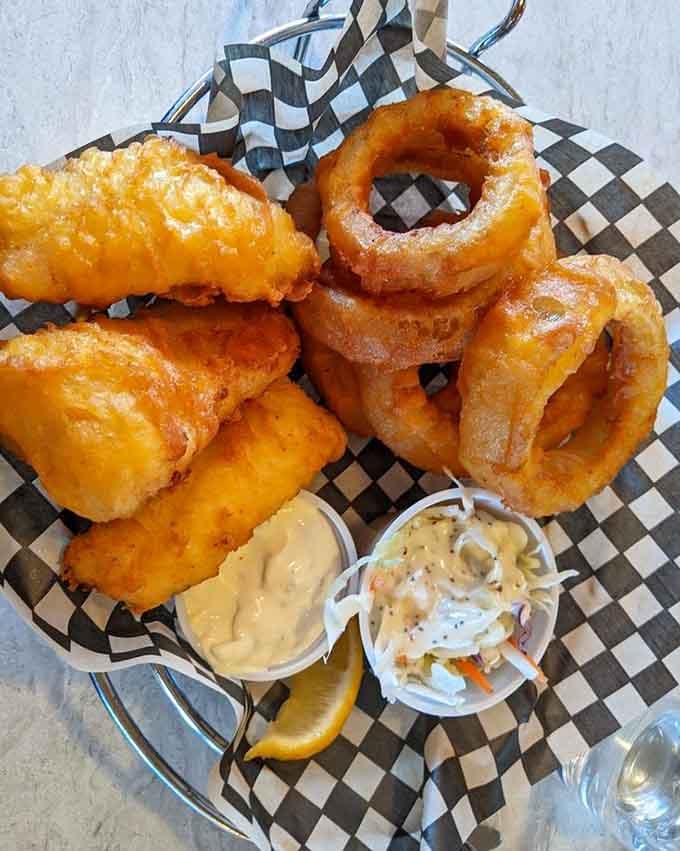 Golden-fried fish and onion rings so crispy they practically sing when you bite into their crunchy exterior.