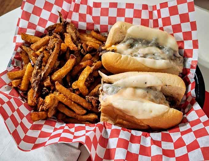Two hoagie rolls stuffed with cheesy, meaty goodness and a mountain of fries prove that Philly isn't the only place doing it right.