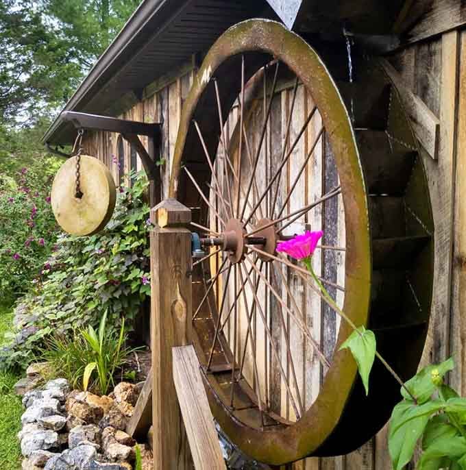 An old mill wheel adds authentic charm that shows someone sweated every single detail of this place.
