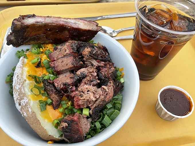 A loaded baked potato becomes a full meal when you pile it high with smoked meat glory.