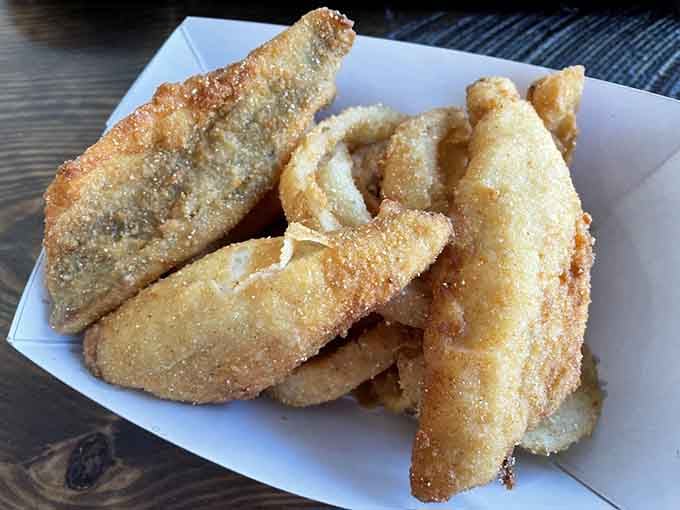 Perch and onion rings together create the kind of harmony usually reserved for great duets.