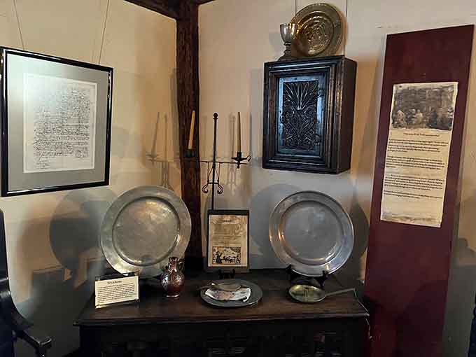 Pewter plates and candlesticks served meals by flickering light, because electricity was centuries away from invention.
