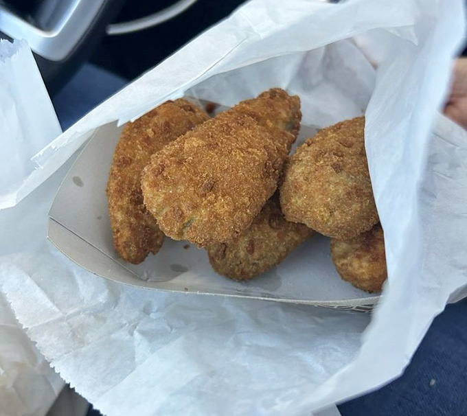 Jalape&ntilde;o poppers with that perfect golden breading, ready to deliver heat and cheese in equal measure.
