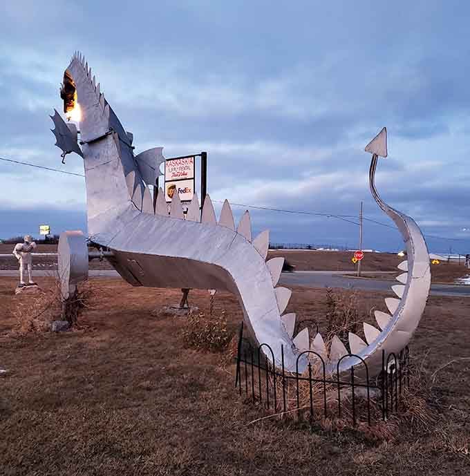 From behind, you can appreciate the full wingspan and tail of this magnificent prairie-dwelling creature.