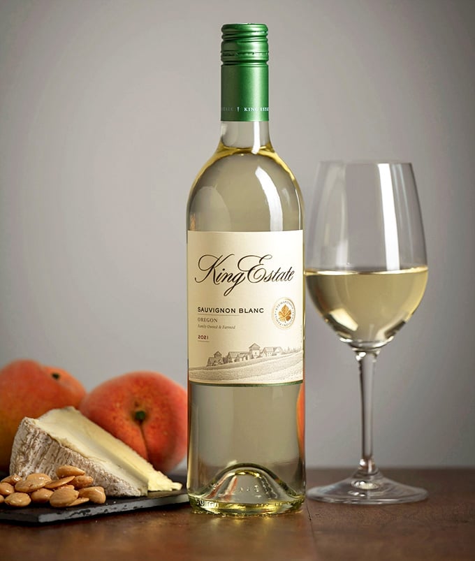 That golden glow in the glass promises crisp, refreshing flavors that'll make you forget it's only Tuesday.
