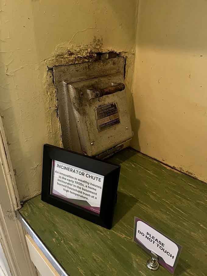 Even the old incinerator chute gets preserved here, because apparently everything deserves respect, including vintage garbage disposal systems.