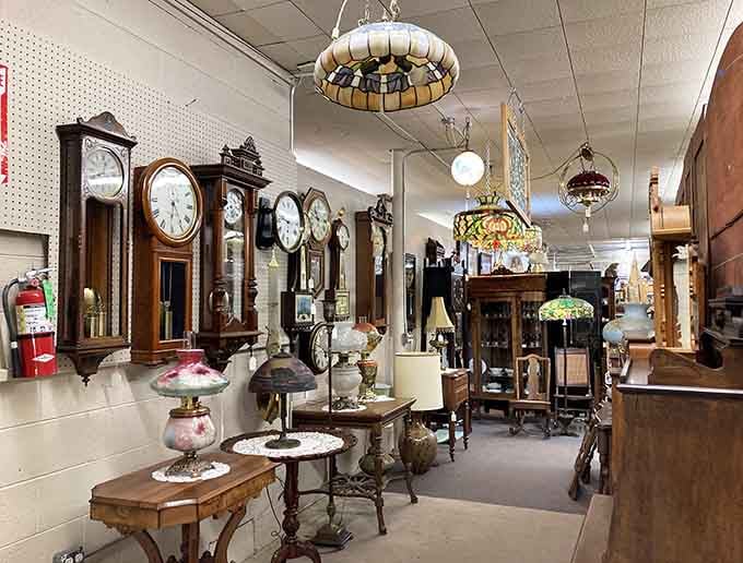 A wall of antique timepieces proving that before smartphones, people actually had style when checking the hour.