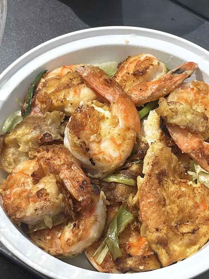 Hawaiian BBQ shrimp gets the golden treatment it deserves, looking like edible treasure fresh from the islands.