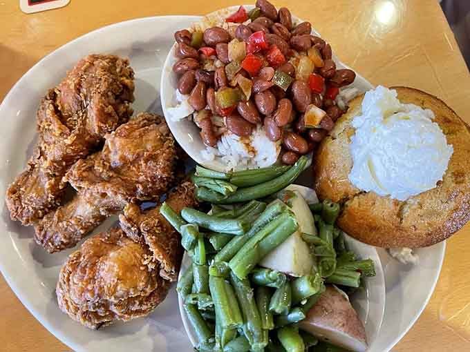 Fried chicken so good it deserves its own fan club, surrounded by Southern sides done right.