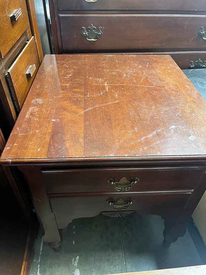 This nightstand has stories to tell, scratches included, perfect for your next DIY refinishing project.