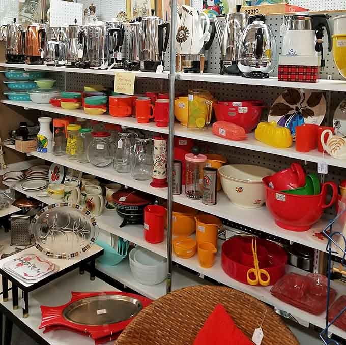 Colorful kitchenware lines the shelves, proving our grandparents knew how to make cooking look absolutely fabulous.