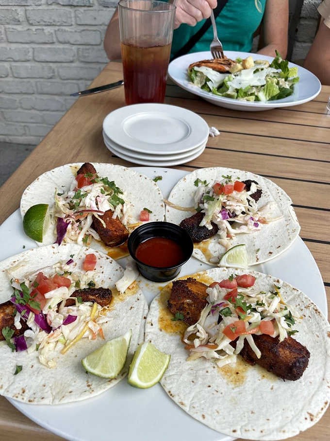 Fish tacos on the patio prove that Bloomington summers were made for outdoor dining and fresh seafood.