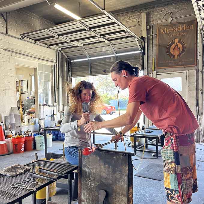 Expert guidance transforms nervous beginners into confident creators, one careful instruction at a time during hands-on sessions.
