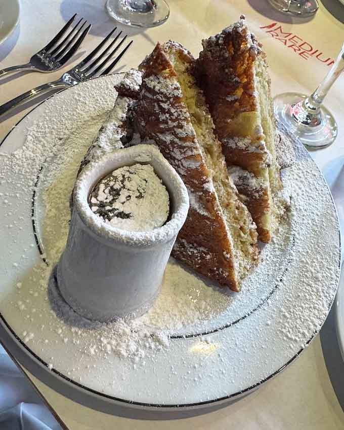 French toast dusted with powdered sugar and served with whipped cream&mdash;breakfast never looked so indulgent or inviting.