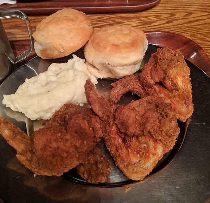 When your plate includes both fried chicken and fluffy biscuits, you've basically won at lunch.