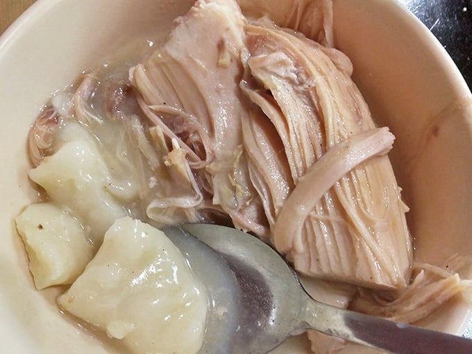 Chicken and dumplings swimming in comfort, the kind that fixes bad days and cold weather alike.