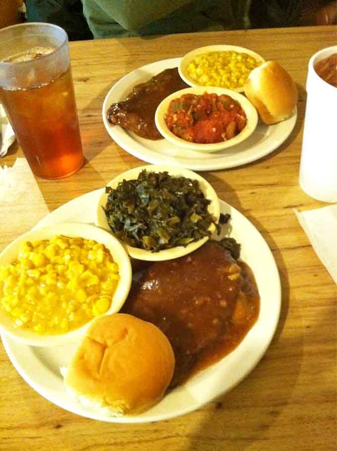 Cube steak smothered in gravy with corn and collards is comfort food that hugs you from the inside.