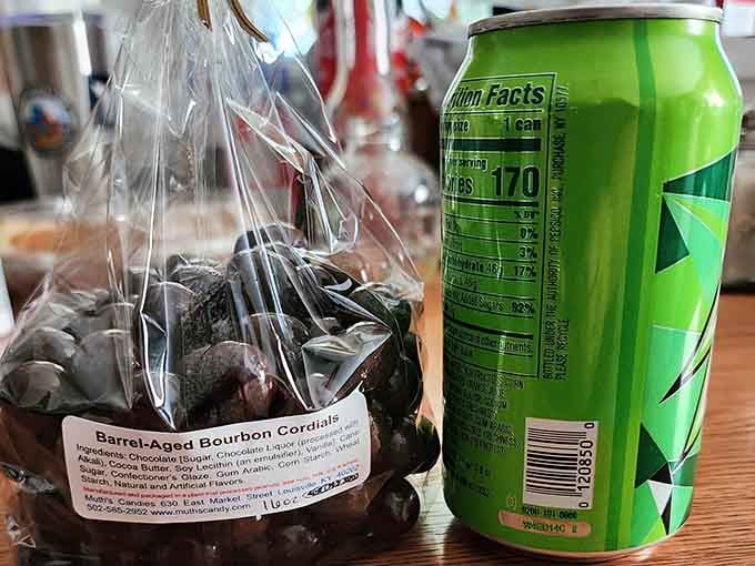 Barrel-aged bourbon cordials sitting next to a soda can &ndash; because Kentucky knows how to do chocolate with a little extra kick of sophistication.