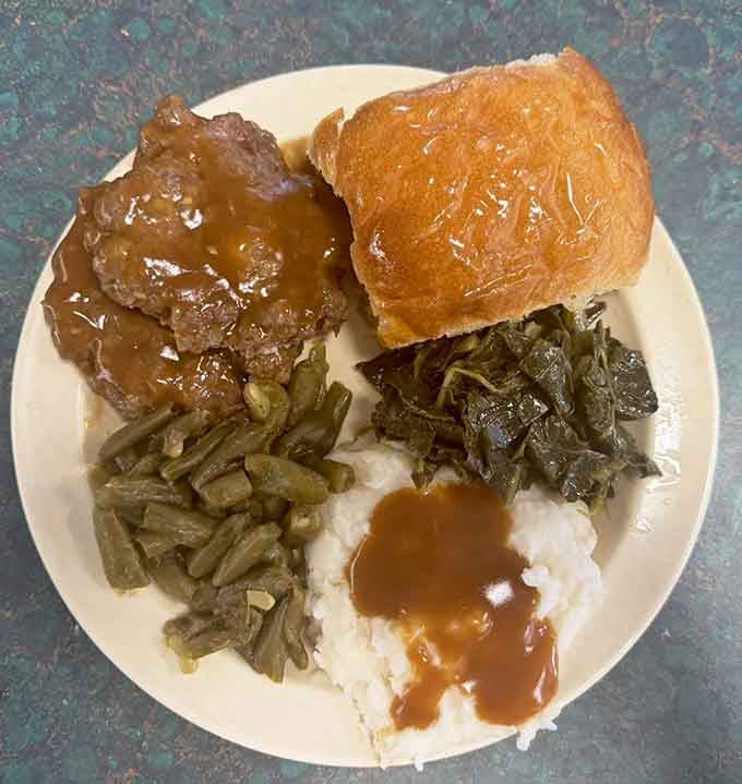 That hamburger steak with gravy looks like it could solve most of life's problems, or at least make you forget them.