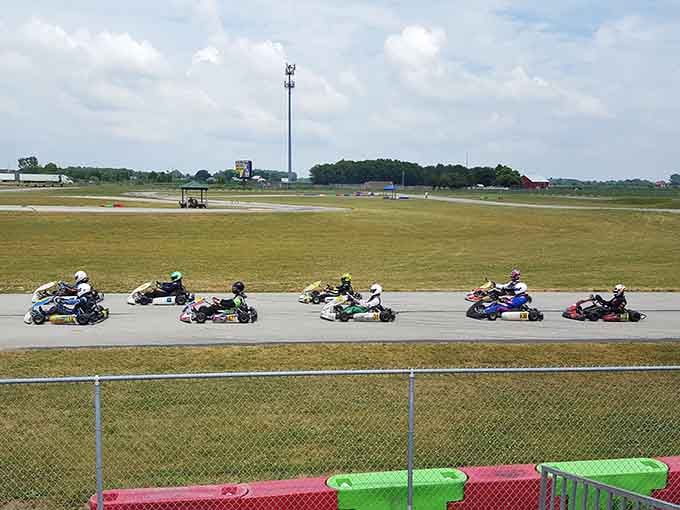 Watch racers navigate the outdoor circuit like caffeinated bees with excellent spatial awareness and helmets.