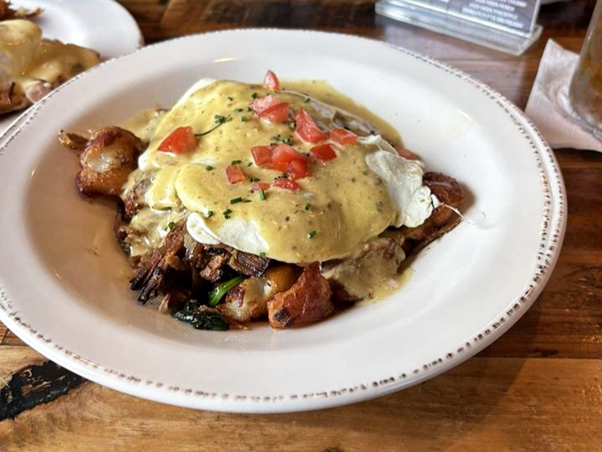 Pulled pork hash topped with eggs and hollandaise, because sometimes breakfast needs to get a little wild.