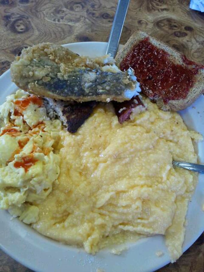 Scrambled eggs, fried fish, and enough carbs to fuel a marathon you'll never actually run.