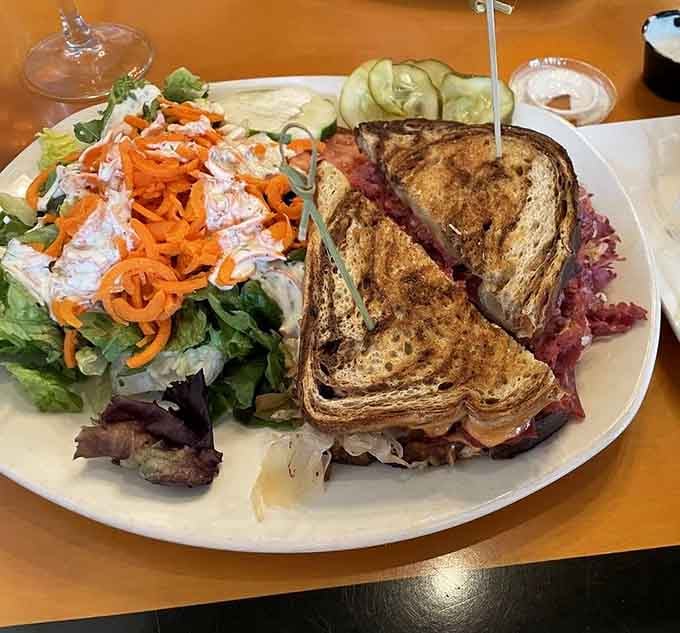 The Reuben arrives properly stacked with corned beef, sauerkraut, and that essential side of Thousand Island for dipping.