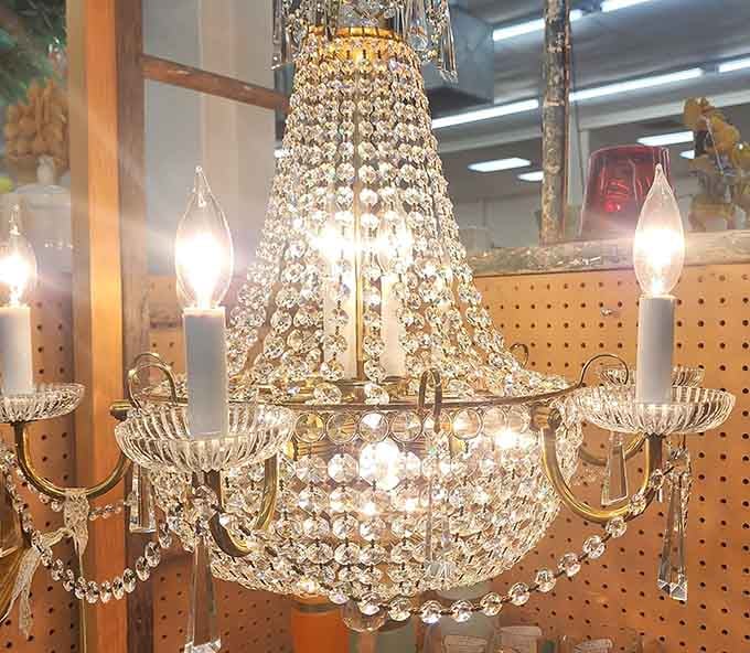 This chandelier drips with elegance, the kind of lighting fixture that makes every dinner feel like an occasion.