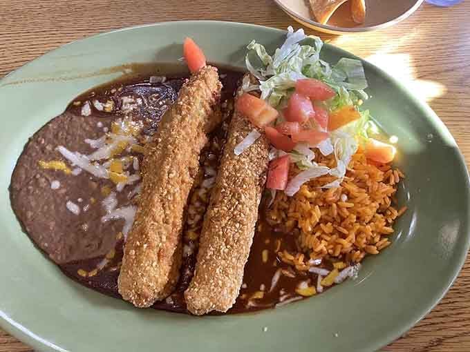 Chile rellenos with that perfect crispy exterior and melted cheese interior, basically comfort food wearing a fancy hat.