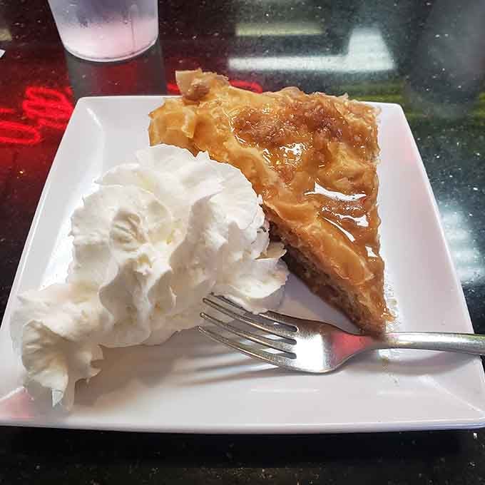 Greek-style apple baklava pie with whipped cream is the kind of dessert that makes you forget about calories.