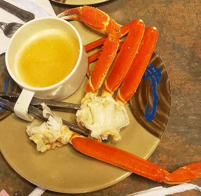 Snow crab legs with melted butter waiting patiently, ready to make your hands messy and your heart happy in equal measure.