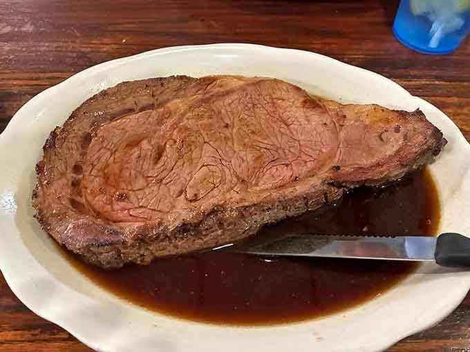 Prime rib swimming in gravy, the kind of plate that makes you understand why elastic waistbands were invented.