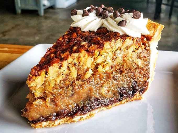Bourbon pie topped with whipped cream and chocolate chips because sometimes more really is more.
