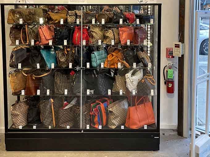 Designer handbags displayed like museum pieces, except these masterpieces come with price tags that won't require a loan.