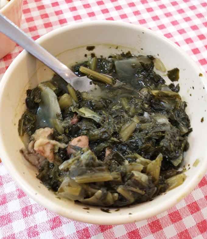 Collard greens cooked the right way, slow and flavorful, proving vegetables can absolutely hold their own.