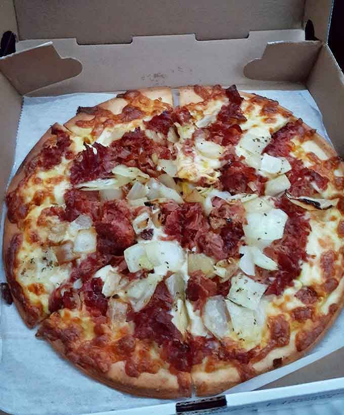 Gluten-free crust topped with pastrami proves that dietary restrictions don't mean sacrificing flavor or that New York deli vibe.