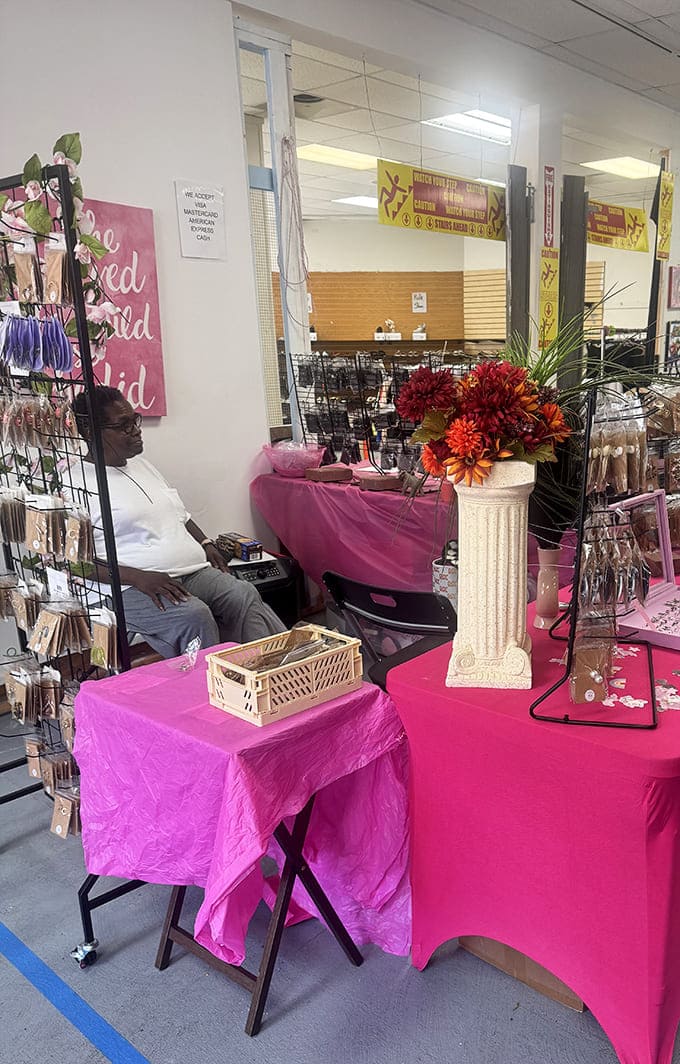 Bright tablecloths and jewelry displays create little islands of possibility throughout the indoor market.