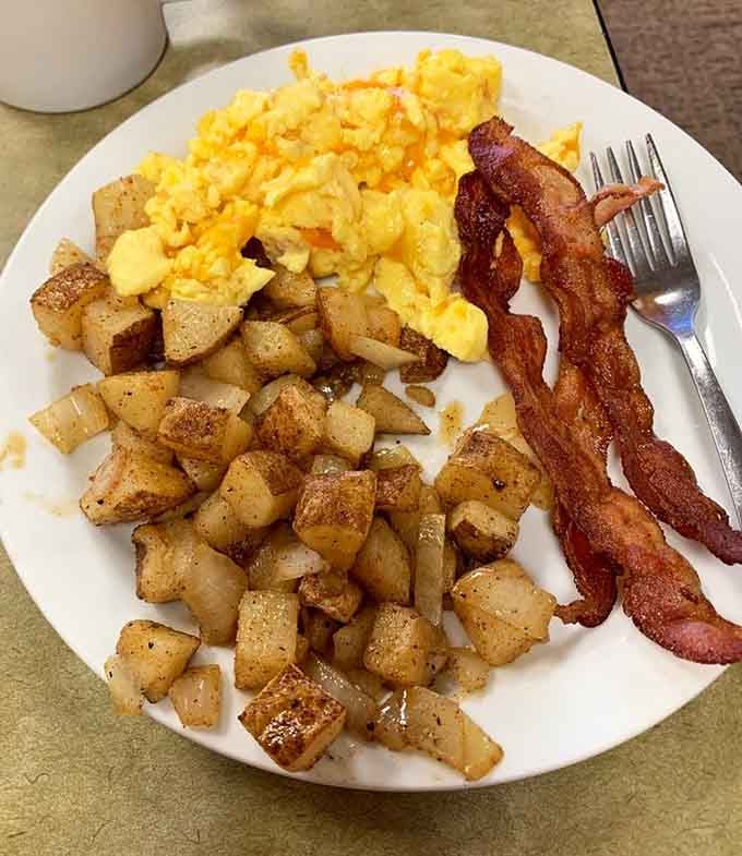 Crispy bacon, perfectly cooked eggs, and seasoned hash browns create the breakfast trinity we all need.