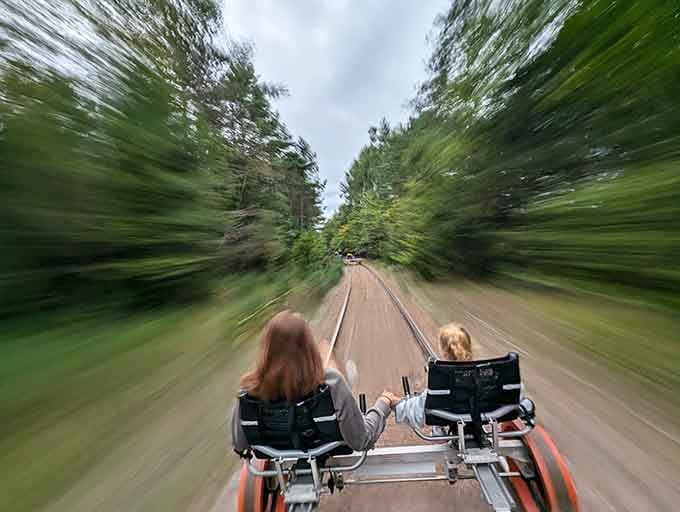 The forest becomes a green blur when you pick up speed, creating a sensation that's thrilling without being terrifying.
