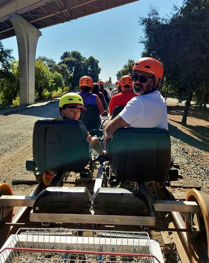 Here's proof that the family that pedals together stays together, especially when railroad tracks are involved.