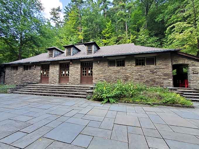 The historic bathhouse stands ready to serve swimmers, built with the kind of stonework they don't do anymore.
