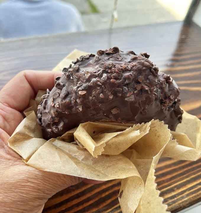 The Grim Reaper never looked so appetizing, loaded with toppings that would make any chocolate lover weep with joy.
